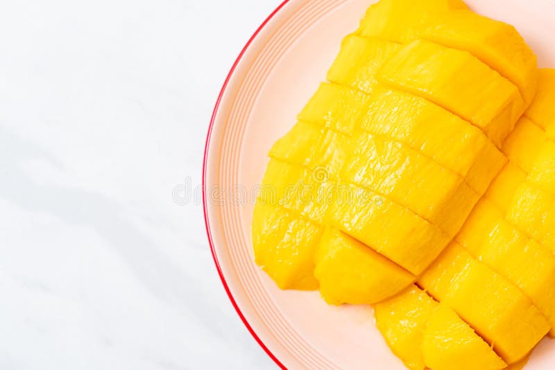 Fresh and golden mango stock photo. Image of nature - 199464580