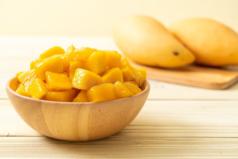 Fresh and golden mangoes stock photo. Image of freshness - 141867400