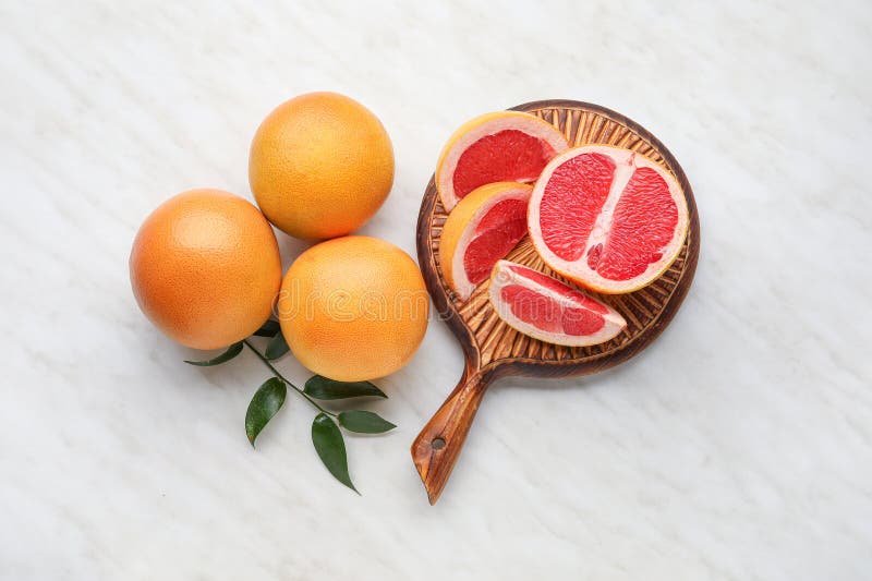 Fresh Grapefruits on Light Background Stock Image - Image of eating ...