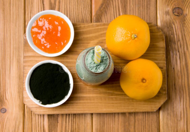 Fresh Grass Growing in the Ground and Garbage from Human Waste Stock ...