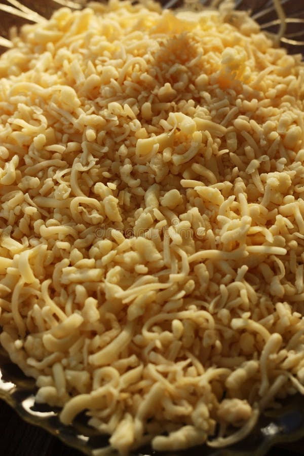 Fresh Grated Cheese on a Plate Macro Stock Photo - Image of village ...