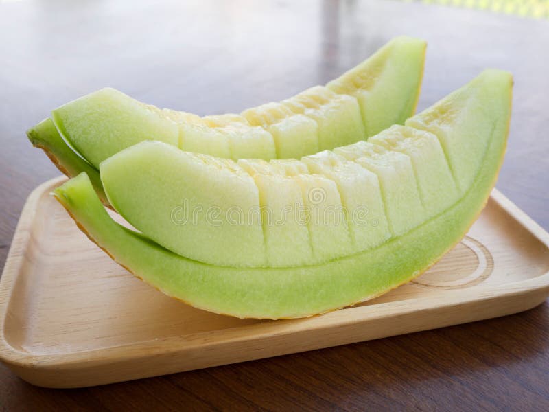 Fresh Green Melon on Wood Plate Stock Image - Image of sweet, delicious ...