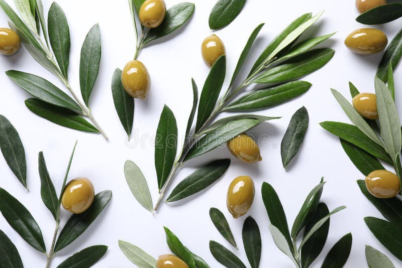 Fresh Green Olives and Leaves on White Background, Flat Lay Stock Image ...