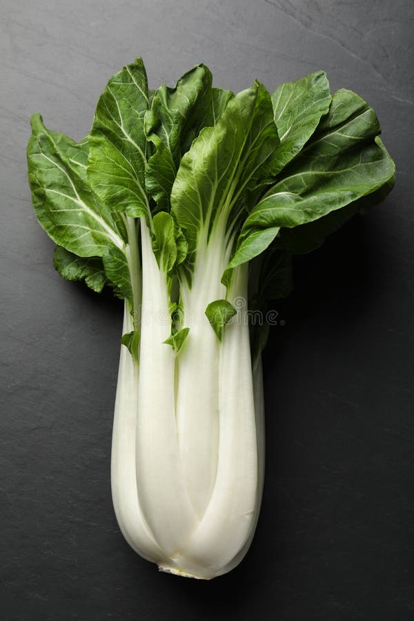 Fresh Green Pak Choy Cabbage on Black Table, Top View Stock Image ...