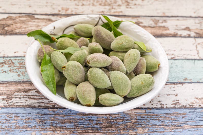 Unripe Almonds in Bag on Vintage Table Stock Photo - Image of leaf ...