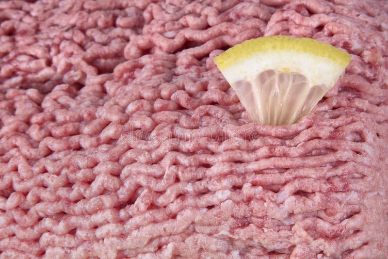 Fresh Ground Beef with Slice of Lemon Stock Photo - Image of meal ...