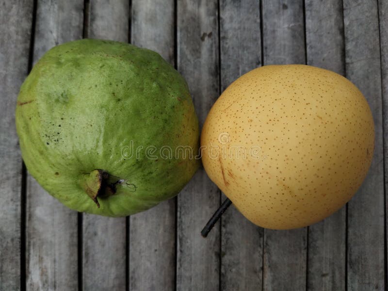 Fresh Guava Fruit and Pear on Bamboo Board Stock Image - Image of juicy ...