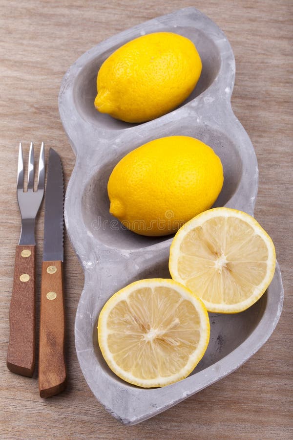 Fresh halved lemon stock image. Image of silverware, bitter - 20749039