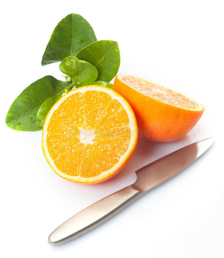 A Halved Orange Rests on Oranges in Boxes Stock Photo - Image of citrus ...