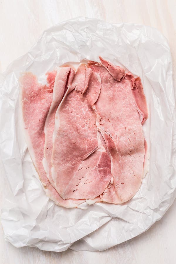 Fresh Ham on White, Crumpled Wrapping Paper on Wooden Rustic Background ...