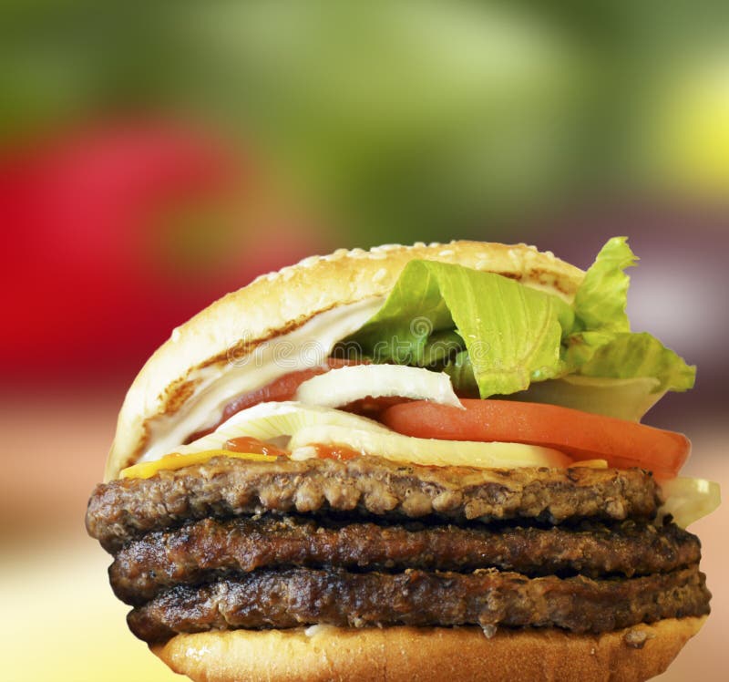 Fresh Hamburger Against Colorful Vegetable Background Stock Photo ...