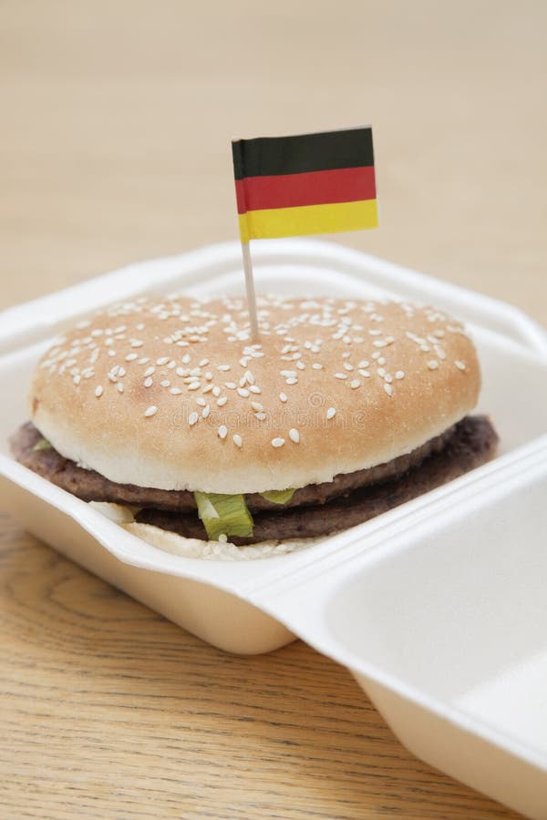 Fresh Hamburger with German Flag Decoration on Wooden Surface Stock ...