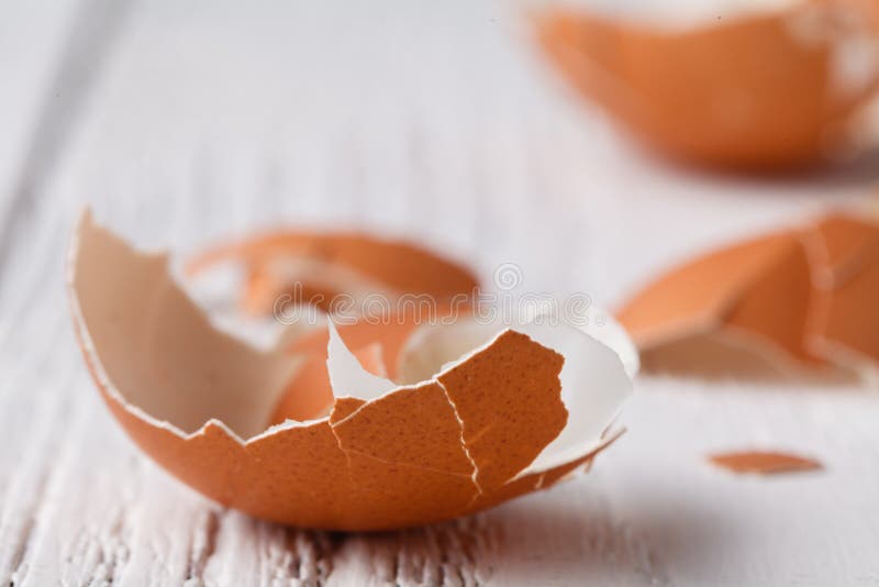 Fresh Hard Boiled Eggs with Shell beside on Wooden Board Stock Photo ...