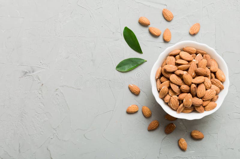 Fresh Healthy Almond in Bowl on Colored Table Background. Top View ...