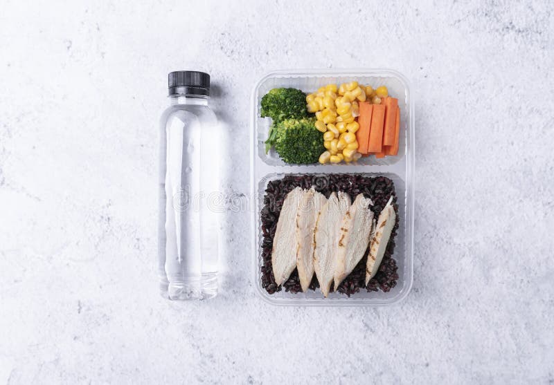 Fresh Healthy Diet Lunch Box with Vegetable Salad and Water Bottle on ...