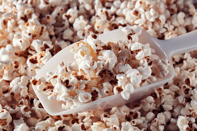 Heap of popcorn in a scoop stock photo. Image of popcorn - 180159656