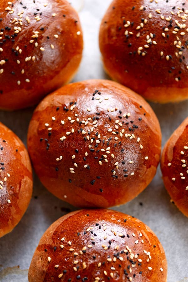 Fresh Homemade Hamburger Buns, Baps on Baking Paper Stock Photo - Image ...