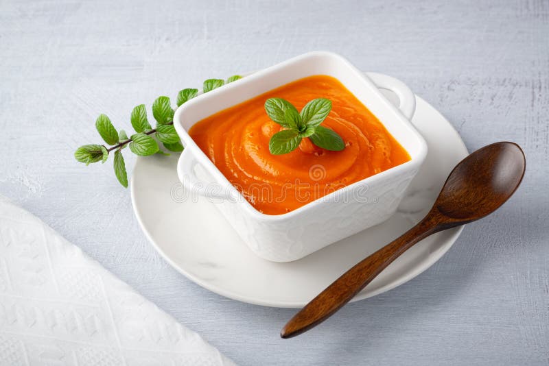 Fresh Homemade Pumpkin Puree in a White Plate Stock Photo - Image of ...