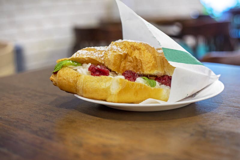 Fresh Hot Croissant with Pink Vinaigrette in a Plate on the Table ...