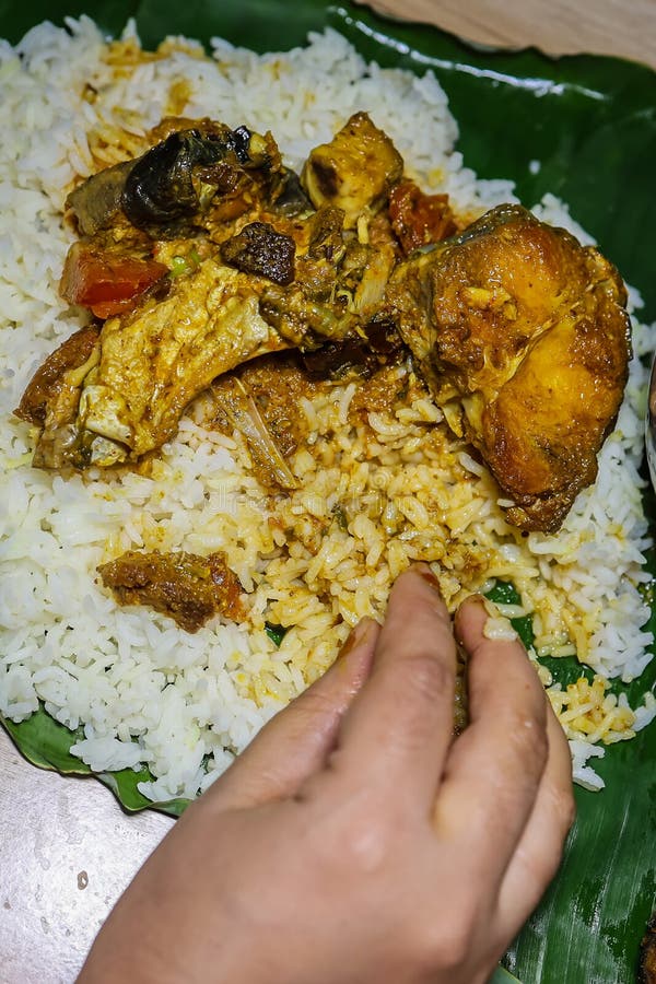 Fresh and Hot Fish and Rice Cooked Meal Served at Banana Leaf for ...