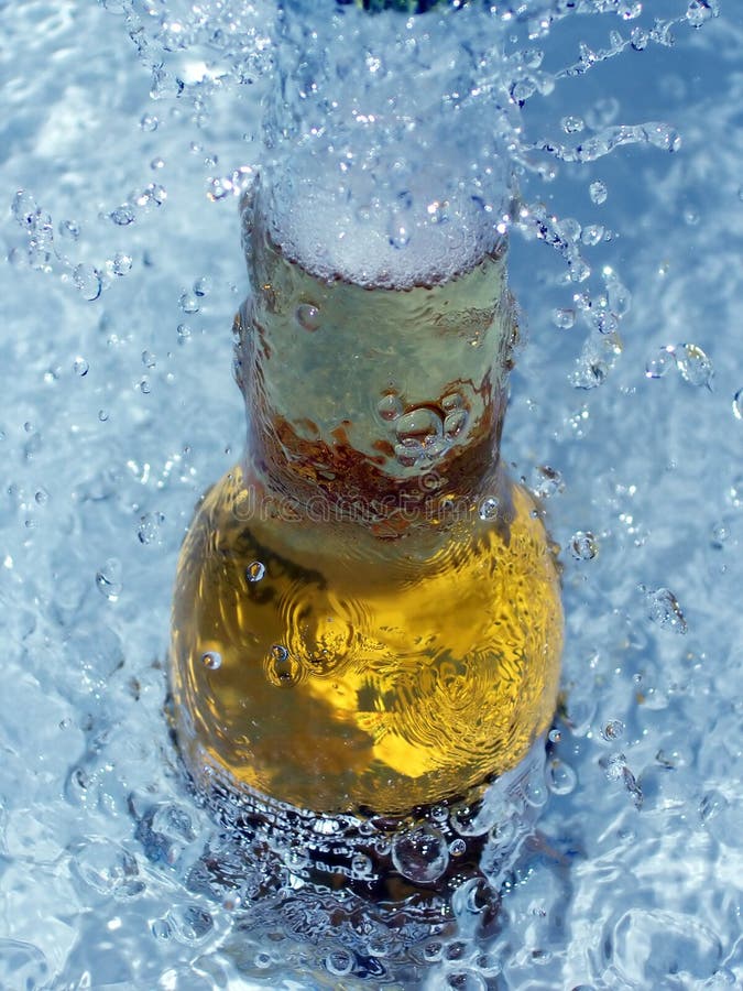 Fresh ice beer stock photo. Image of foam, pour, bottle - 24794
