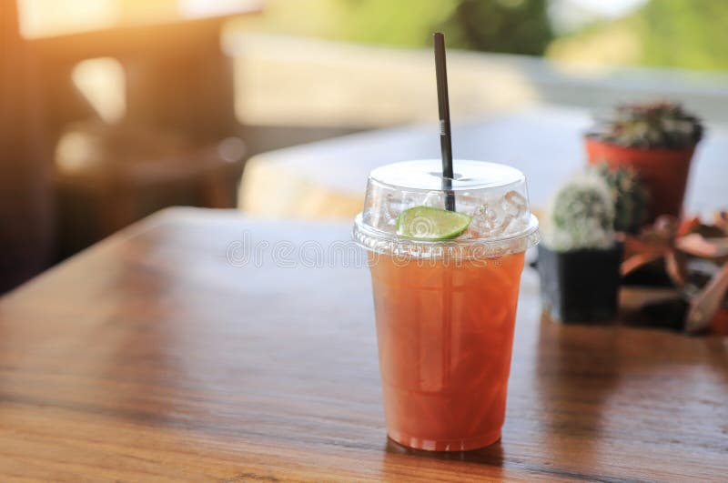 Fresh Iced Tea with Lime in Plastic Cup Stock Photo - Image of plastic ...