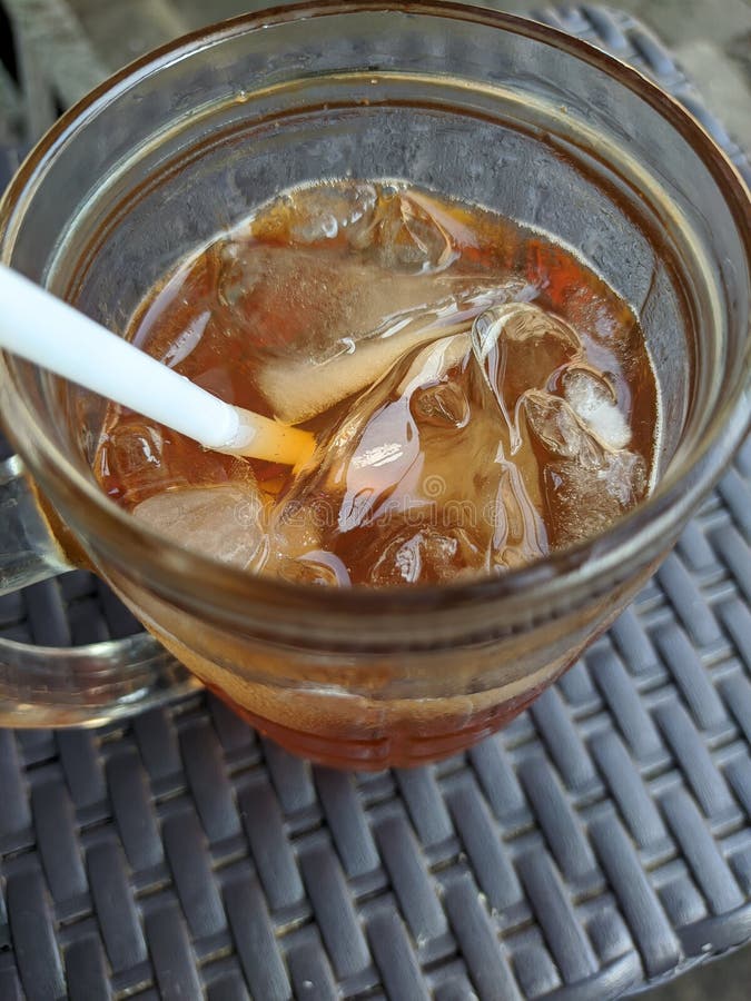 Fresh Iced Tea with White Straw Inside Stock Image - Image of iced ...
