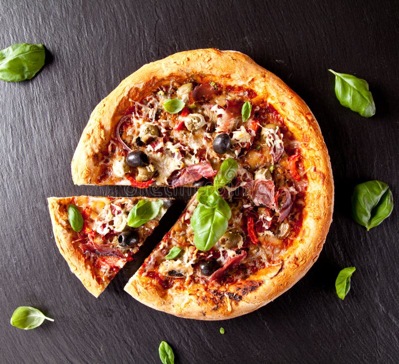 Fresh Italian Pizza Served on Black Stone Stock Image - Image of ...