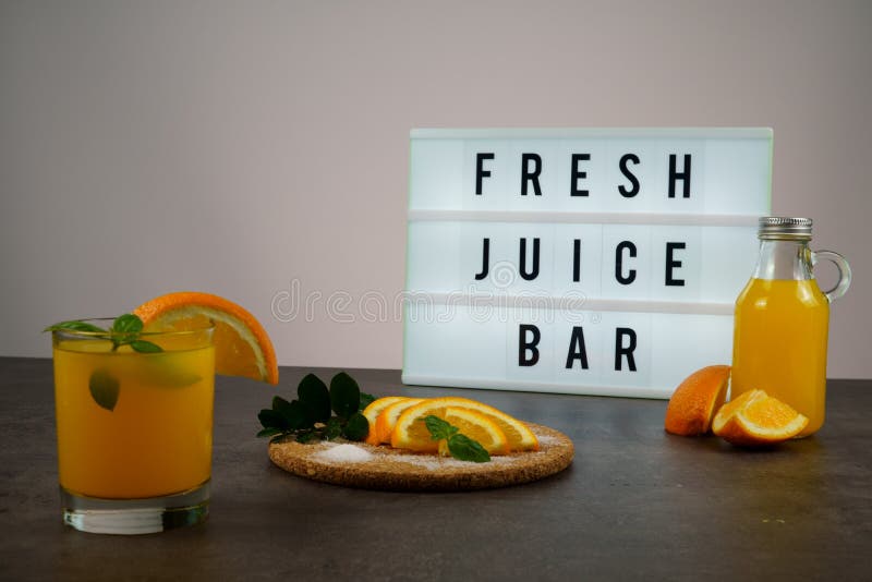 Fresh Juice Bar Concept. Oranges with Fresh Orange Juice Stock Photo ...