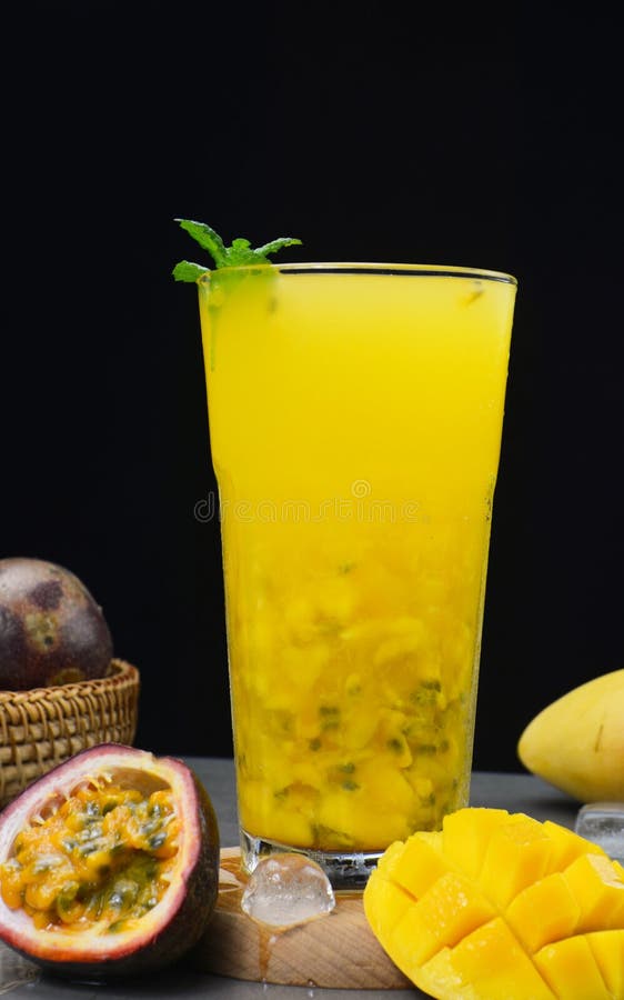 Fresh Juice in a Glass, within Mango and Passion Fruit Stock Image ...