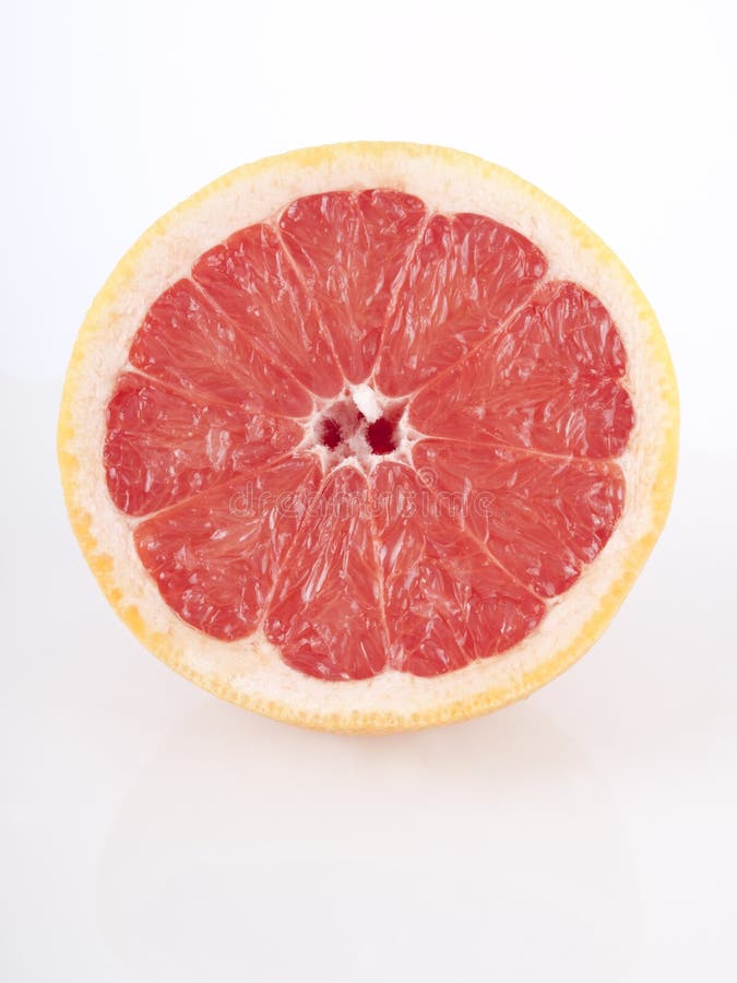 Fresh juicy red grapefruit stock photo. Image of isolated - 13279152