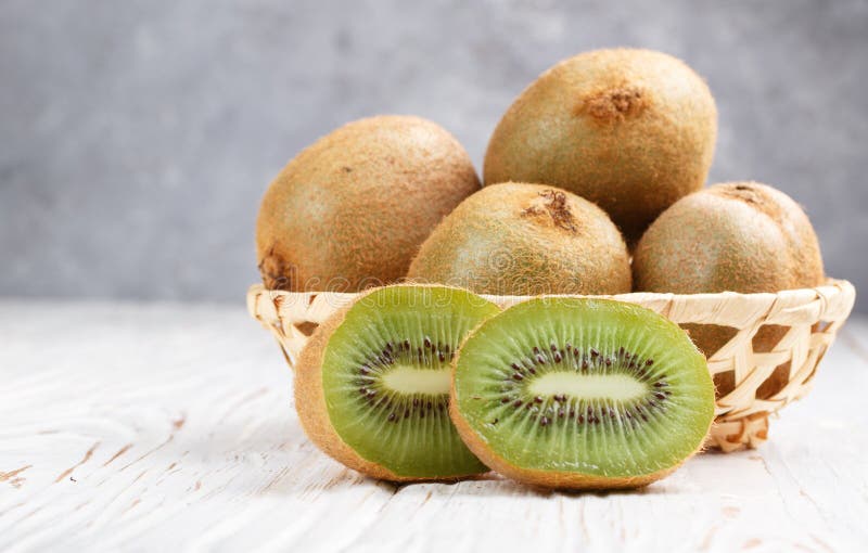 Fresh Kiwi Fruit Whole and Cut Stock Photo - Image of juicy, dessert ...