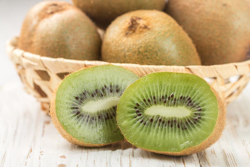 Fresh Kiwi Fruit Whole and Cut Stock Photo - Image of juicy, dessert ...