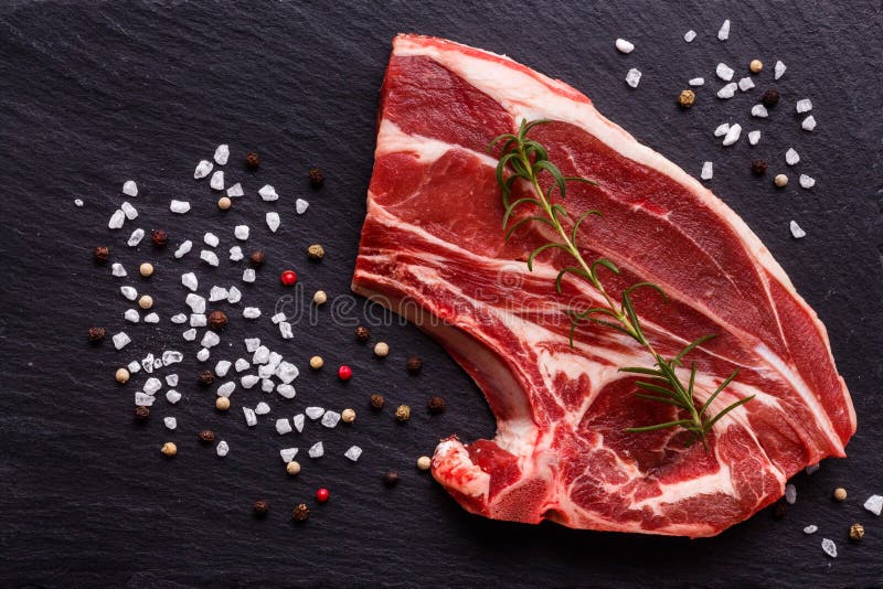 Fresh Lamb Meat On A Textured Stone Plate Stock Photo - Image of meat ...