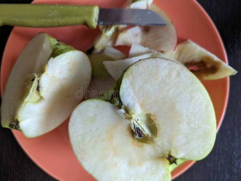 Fresh Large Apple, Which is Cut To Eat on the Plate. Selective Focus ...
