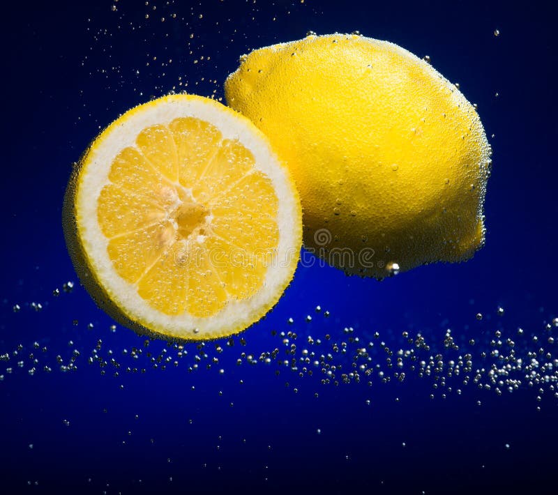 Fresh lemon with bubbles stock image. Image of macro - 31004193
