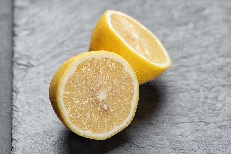 Fresh Lemon on a Grey Stone Board Stock Photo - Image of healthy ...
