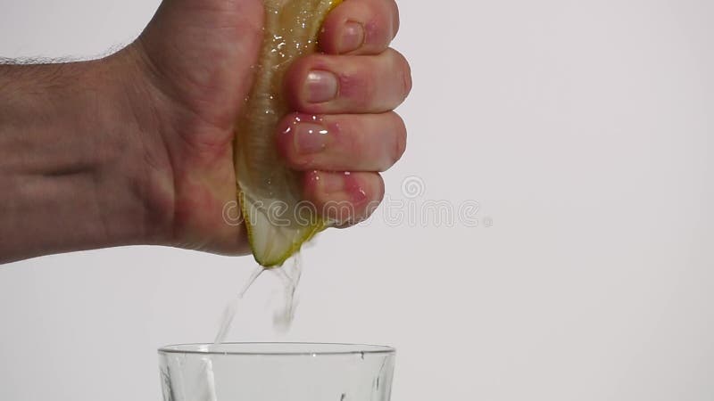Fresh Lemon Juice Being Squeezed by Male Hand Stock Video - Video of ...