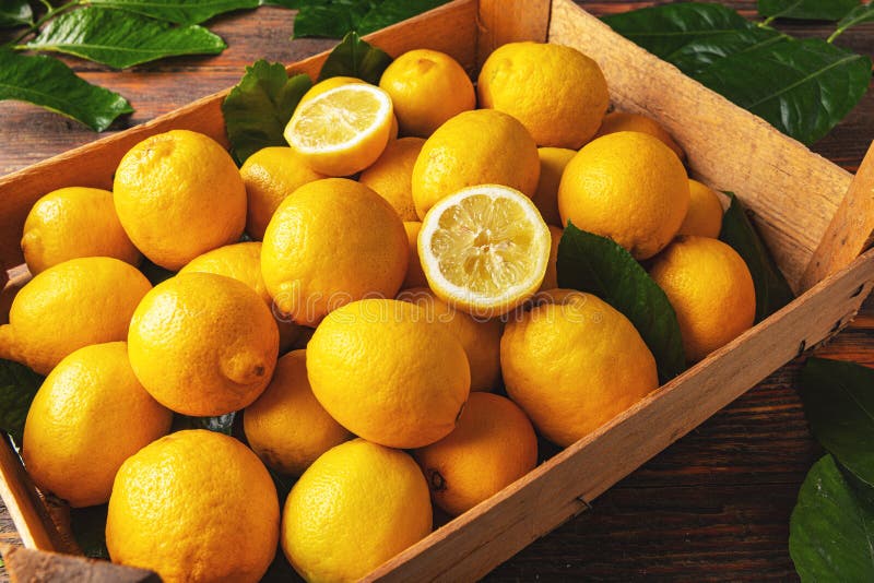 Fresh Lemon with Leaves in Crate Stock Photo - Image of healthy, rustic ...