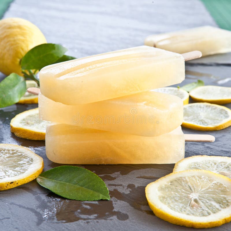 Fresh lemon popsicles stock image. Image of leaves, slate - 38320497