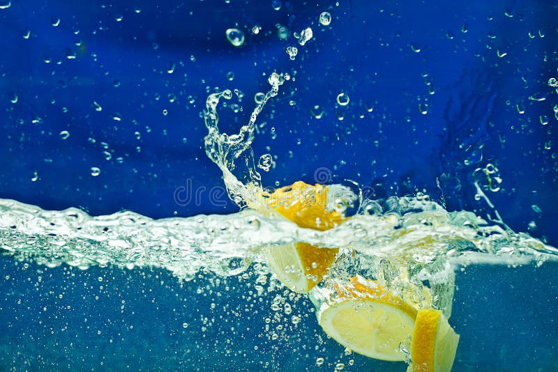 Fresh lemon in water stock image. Image of food, flow - 13090109