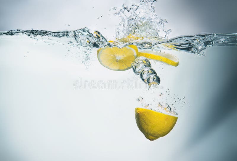 Fresh Lemon in Water with Splash Stock Image - Image of blue, splash ...