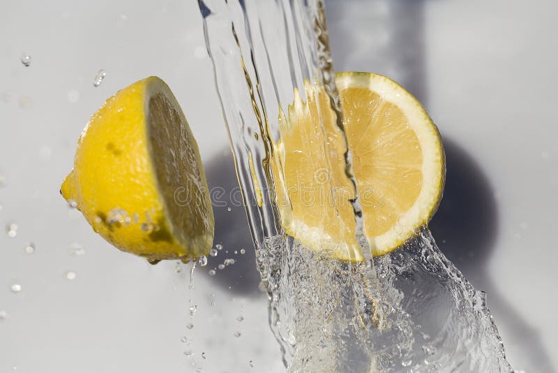 Fresh Lemon and Water Splash on White Background Stock Image - Image of ...