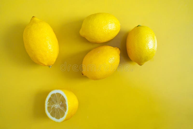 Fresh Lemon on a Yellow Background. Stock Photo - Image of color ...