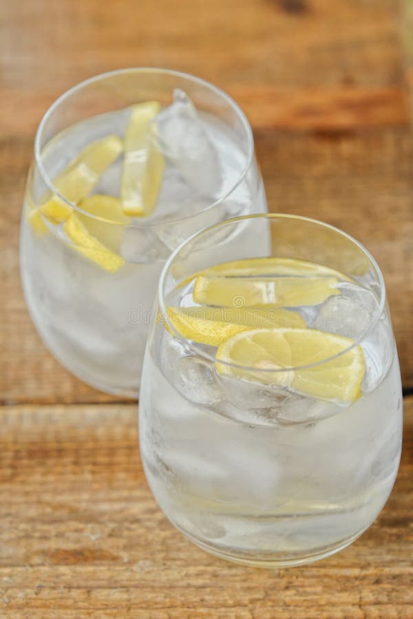 Fresh Lemonade with Ice and Lemon on the Table Stock Image - Image of ...
