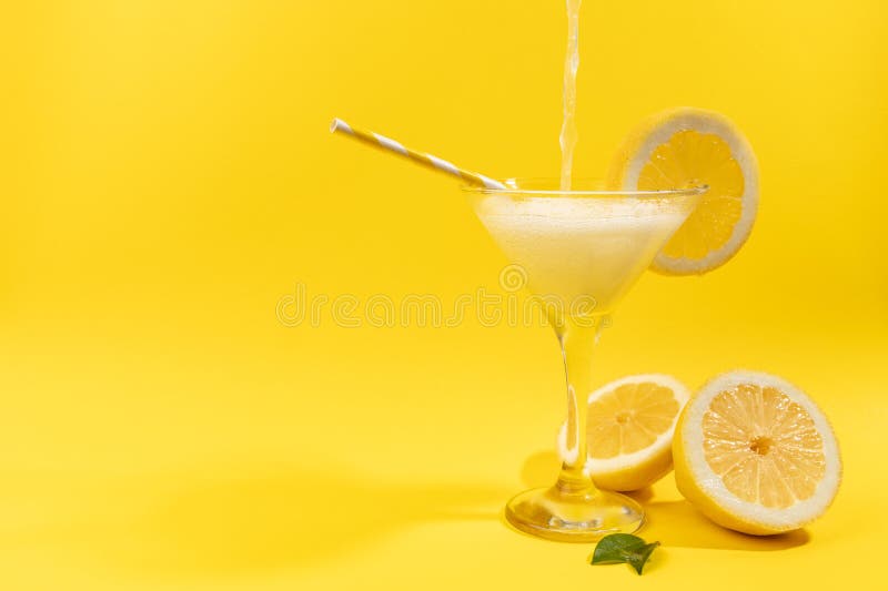Fresh Lemonade with Lemon on Yellow Background Stock Photo - Image of ...