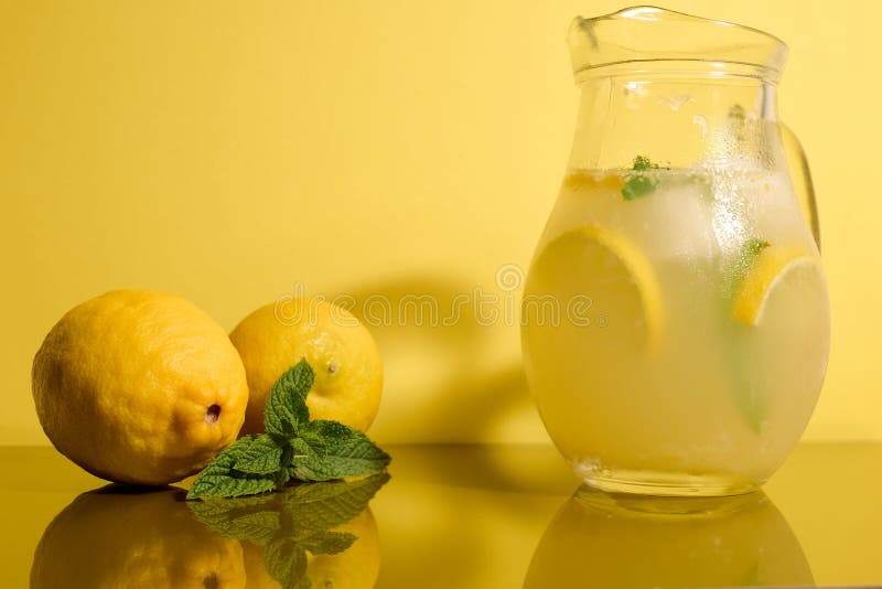 Fresh Lemonade on a Yellow Background Stock Image - Image of lemonade ...