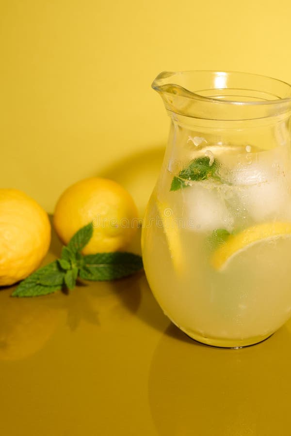Fresh Lemonade on a Yellow Background Stock Image - Image of glasses ...