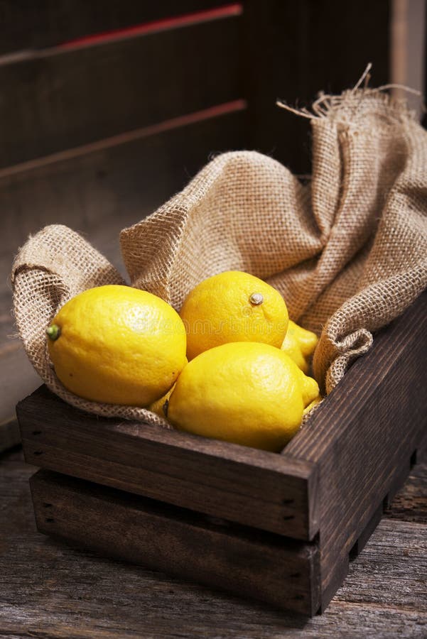 Fresh Lemons in Crate stock photo. Image of groceries - 40875862
