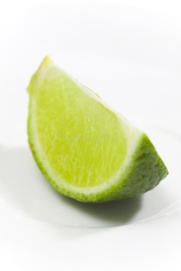 Fresh lime isolated stock photo. Image of lime, closeup - 73214870